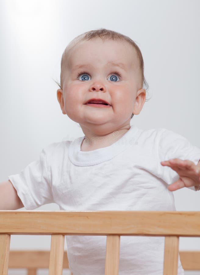 Charming child in the crib stock photo. Image of european - 29247742