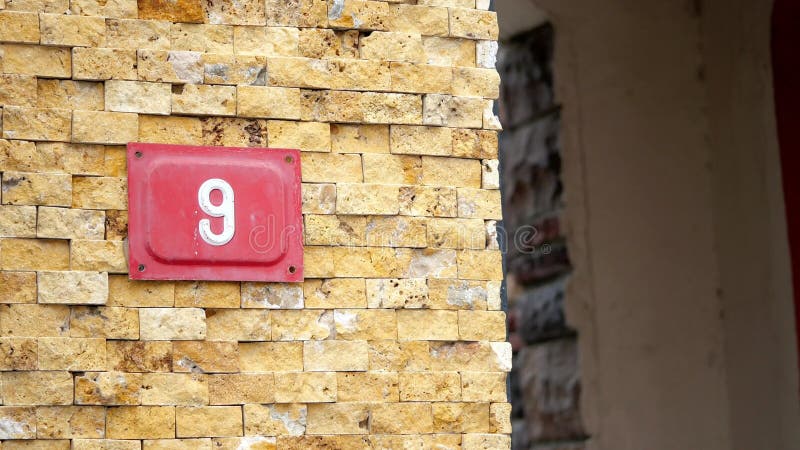 A Charming Entrance Featuring the Number 9 on a Beautiful Rustic Wall ...