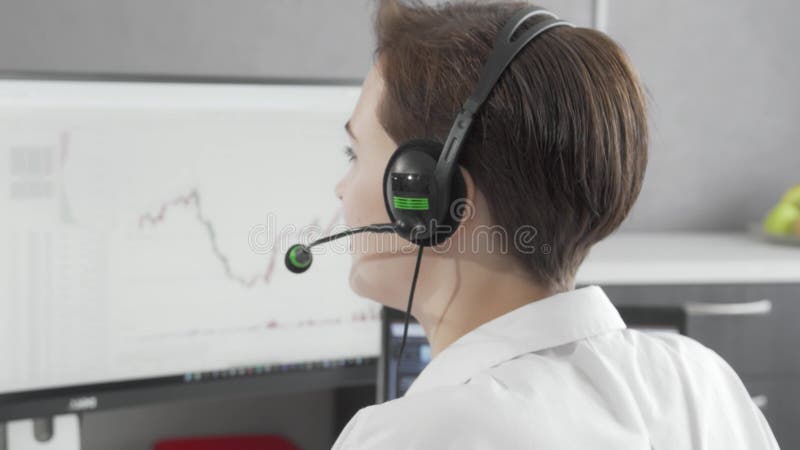 Charming Female Customer Support Agent with Headset, Smiling while Working Stock Footage - Video ...