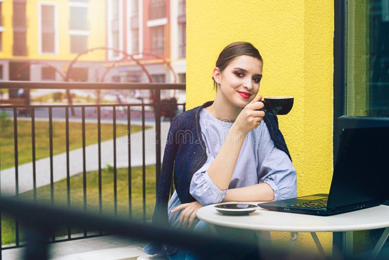 Charming Happy Woman Student Using Laptop Computer To Prepare for the ...