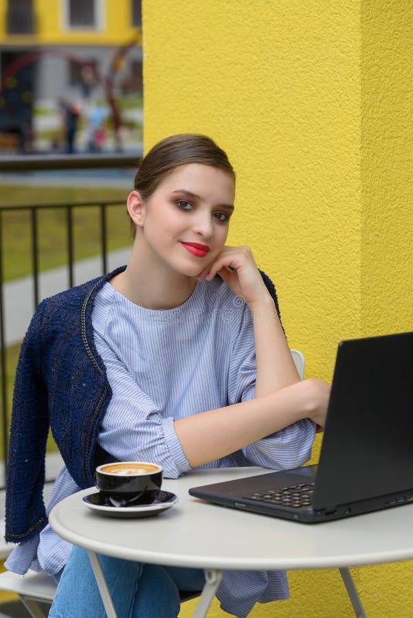 Charming Happy Woman Student Using Laptop Computer To Prepare for the ...