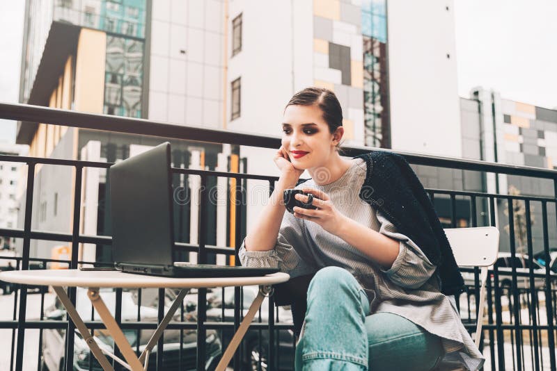 Charming Happy Woman Student Using Laptop Computer To Prepare for the ...