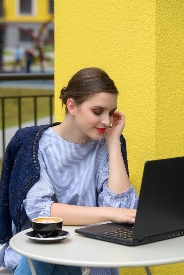 Charming Happy Woman Student Using Laptop Computer To Prepare for the ...
