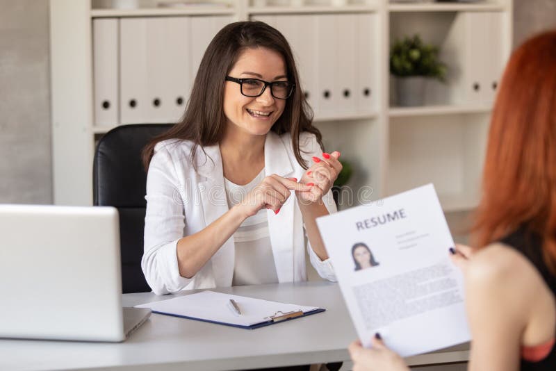 Charming HR Manager in Friendly Manner Leads a Job Interview with One ...