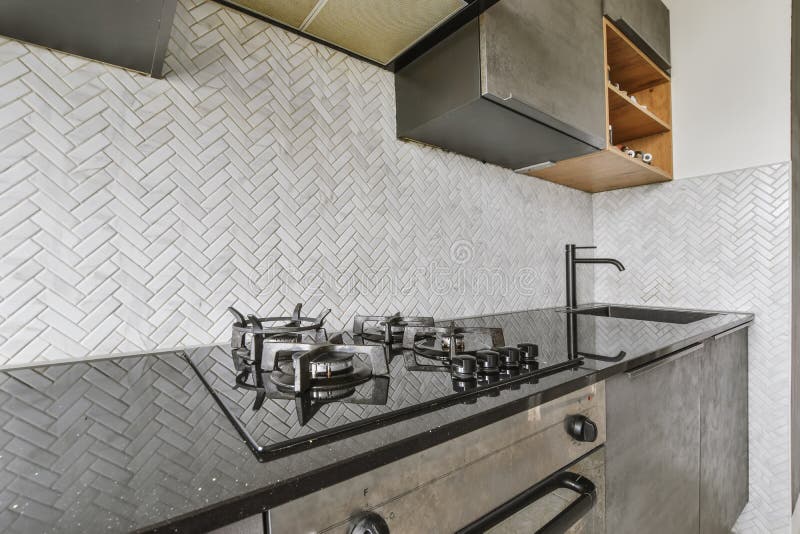 Charming Kitchen Area with a Black Kitchen Set Stock Image - Image of ...