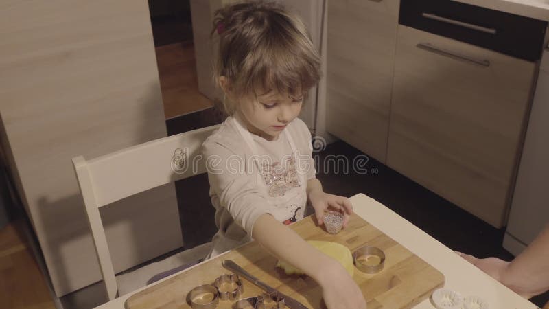 Charming Little Girl Making Biscuits at the Kitchen Table Stock Footage - Video of homemade ...