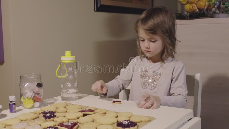 Charming Little Girl Making Biscuits at the Kitchen Table Stock Video - Video of domestic ...