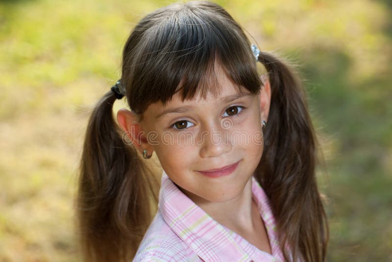 Charming Little Girl with Tails Stock Image - Image of face, adorable ...