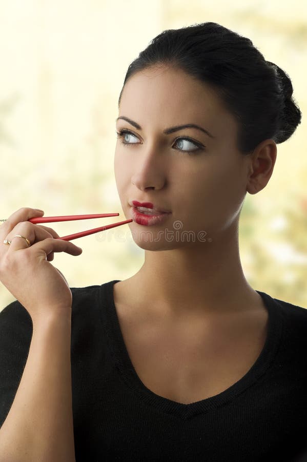 Charming Woman with Chopstick Stock Image - Image of attractive, face ...