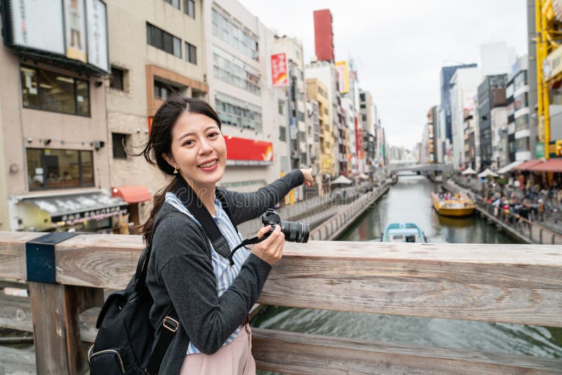 Pointing on famous spot stock photo. Image of location - 101664338