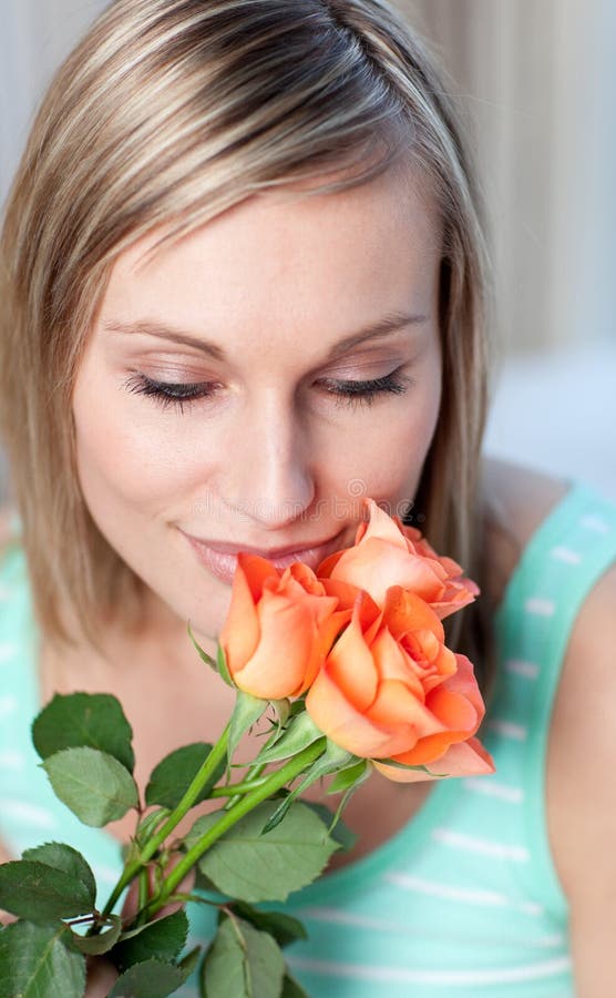 Smelling red roses stock image. Image of profile, roses - 1412041