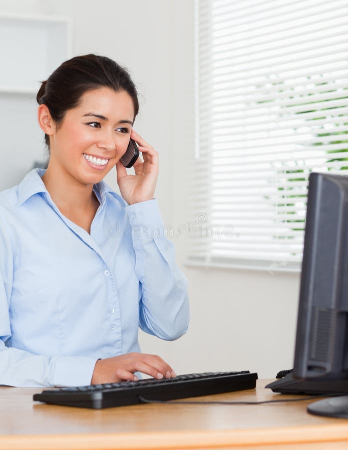 Receptionist Answering Her Company S Phone Stock Image - Image of smile ...