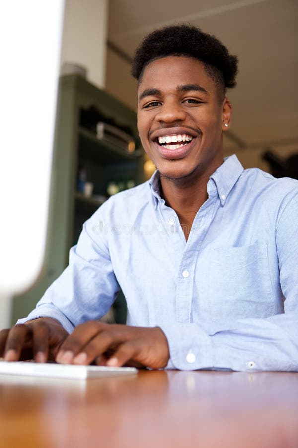Charming Young African Man Working with Computer Stock Photo - Image of ...