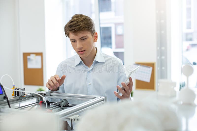 Charming Young Man Watching Process of 3D Printing Stock Image - Image ...