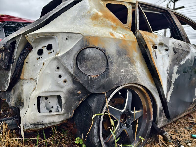 Charred Remnants of a Vehicle Interior Left Behind after a Devastating ...