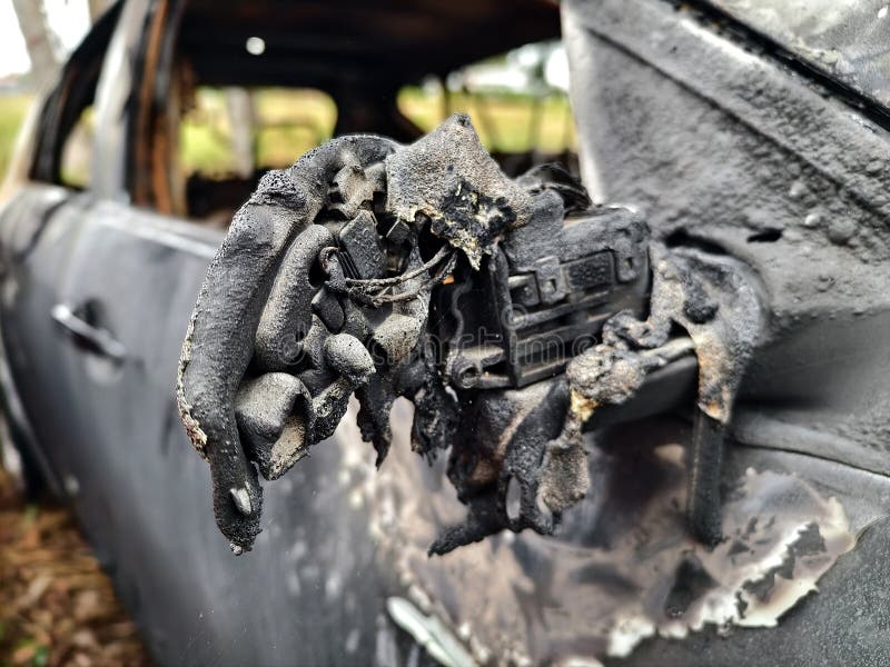 Charred Remnants of a Vehicle Interior Left Behind after a Devastating ...