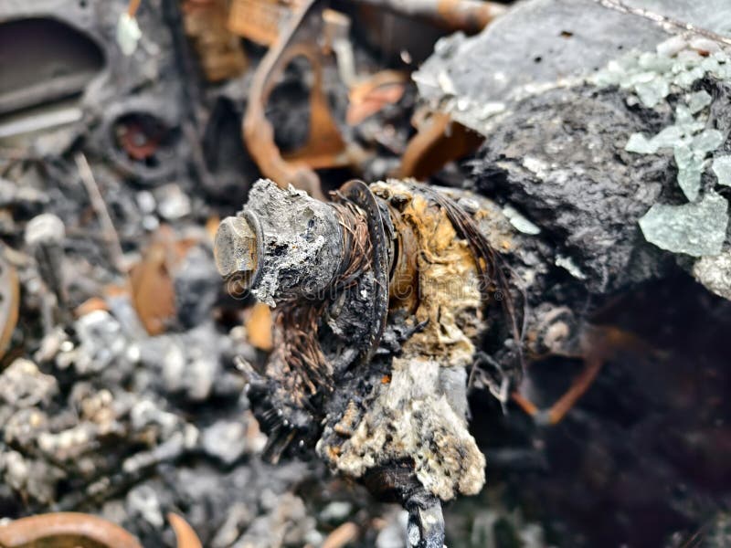 Charred Remnants of a Vehicle Interior Left Behind after a Devastating ...