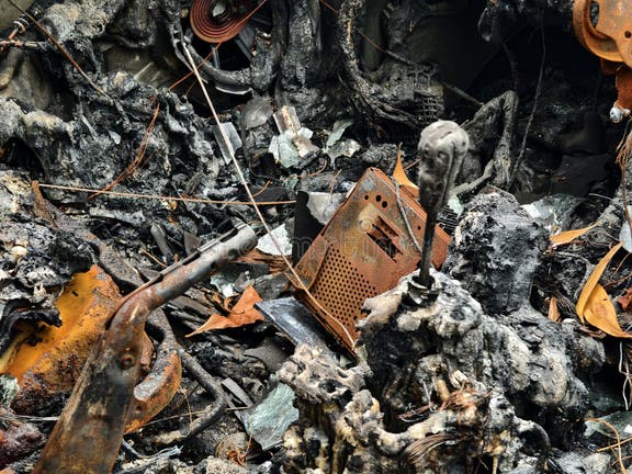 Charred Remnants of a Vehicle Interior Left Behind after a Devastating ...