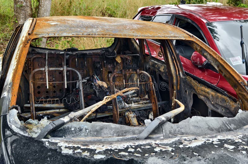 Charred Remnants of a Vehicle Interior Left Behind after a Devastating ...
