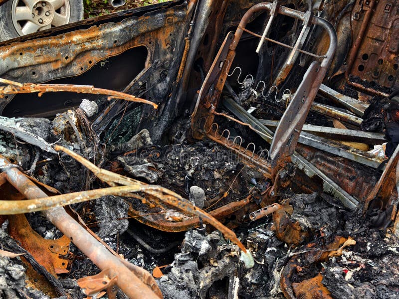Charred Remnants of a Vehicle Interior Left Behind after a Devastating ...