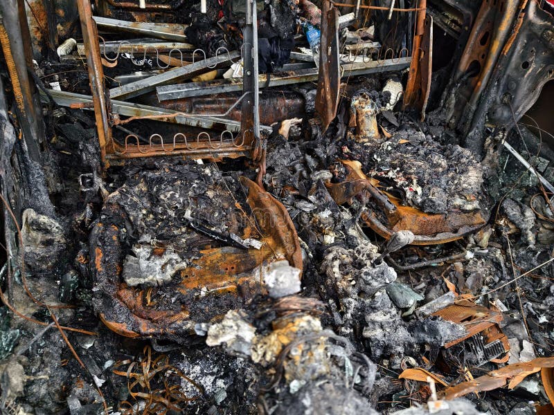 Charred Remnants of a Vehicle Interior Left Behind after a Devastating ...