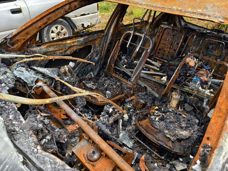 Charred Remnants of a Vehicle Interior Left Behind after a Devastating ...