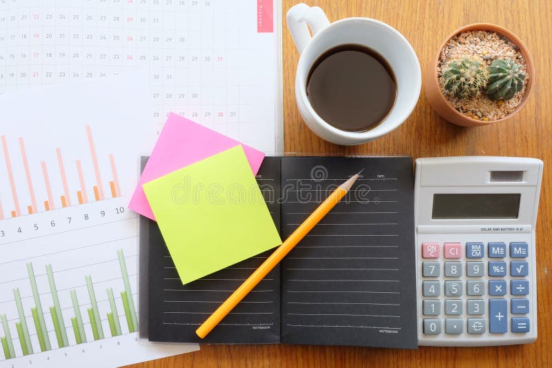 Chart and note book stock image. Image of graph, earning - 53365641