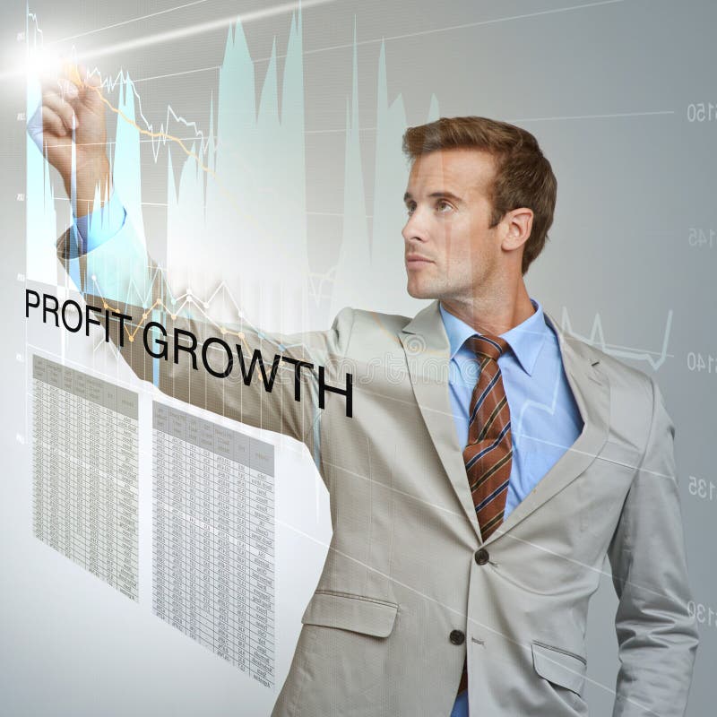 Charting His Profit Growth. a Businessman Using a Digital Interface ...