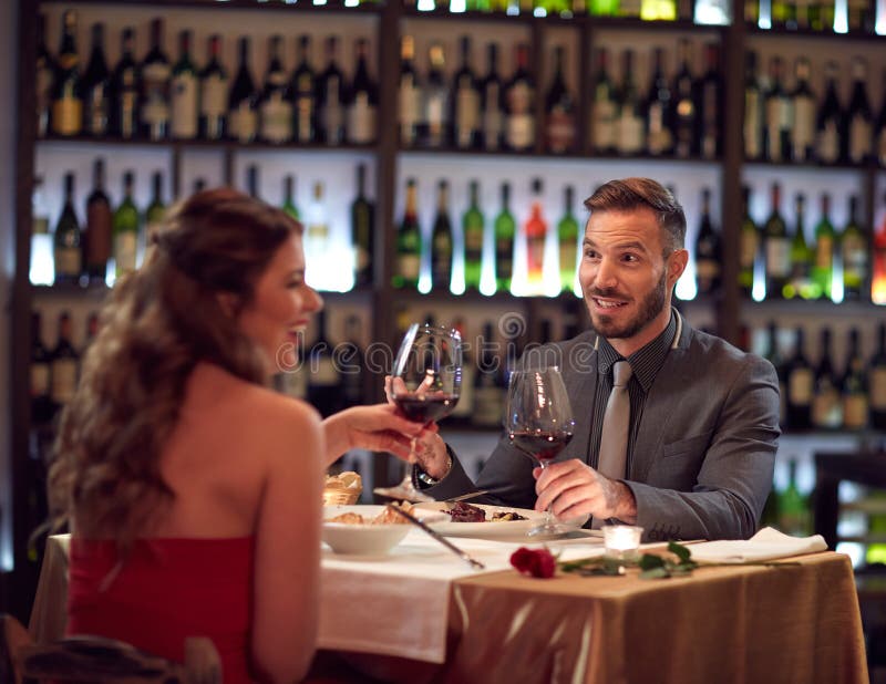 Chat with Good Wine in Restaurant Stock Image - Image of couple, female ...