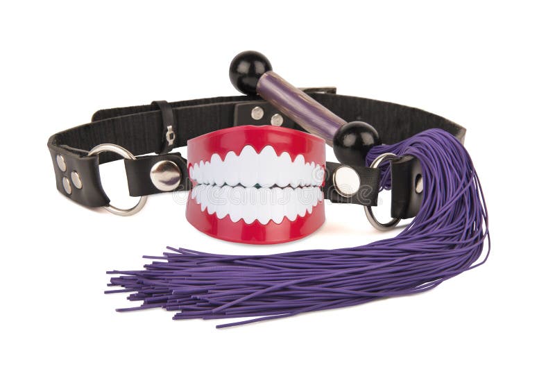 Chattering Teeth Ball Gag and Whip Stock Photo - Image of punishment ...
