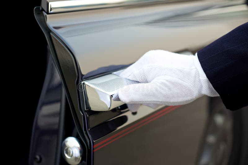 Chauffeur opens car door stock image. Image of rich, valet - 41914671