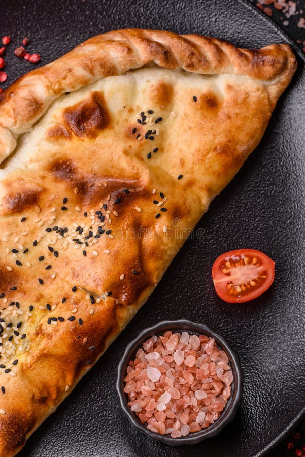Cheburek Meat Pastry Pie with Herbs on the Concrete Background Stock ...