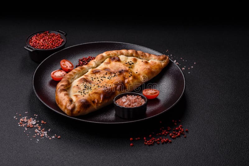 Cheburek Meat Pastry Pie with Herbs on the Concrete Background Stock ...