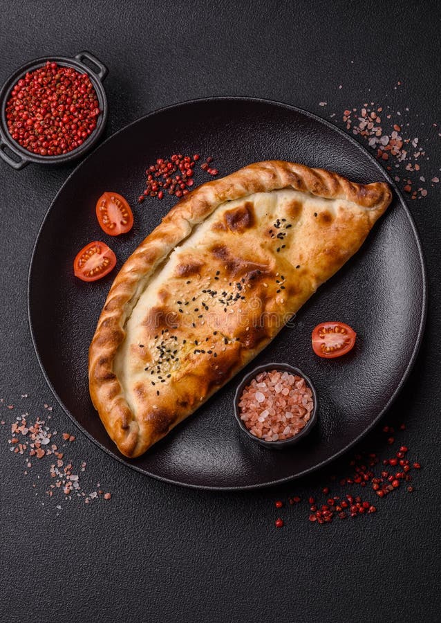 Cheburek Meat Pastry Pie with Herbs on the Concrete Background Stock ...