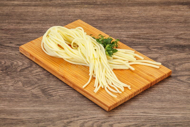 Chechil Spaghetti Cheese Over Board Stock Photo - Image of piece ...