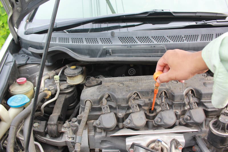 Check the Engine Oil Level in Modern Car Motor Stock Photo - Image of ...