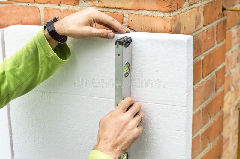 Check Flatness of the Wall Using a Level Stock Photo - Image of walls ...