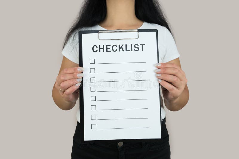 Check List in Hands. a Woman Holds a Checkbook Stock Image - Image of ...