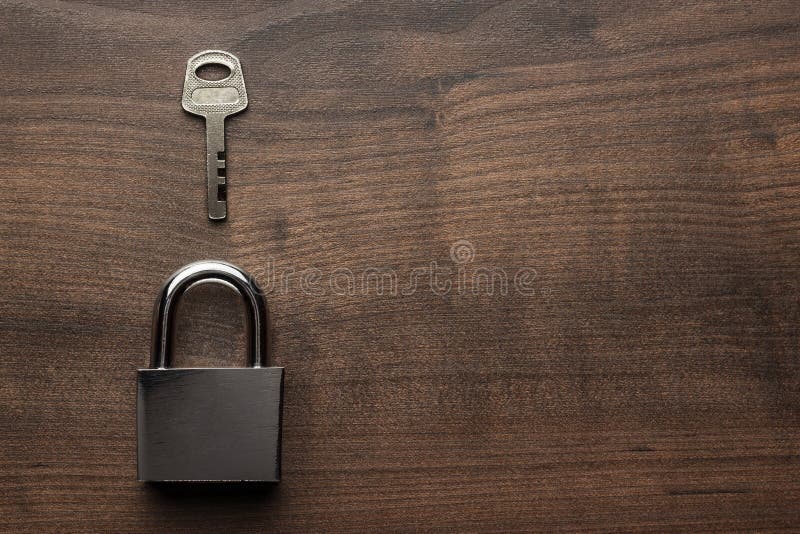 Check-lock and Key on the Brown Wooden Table Stock Image - Image of ...