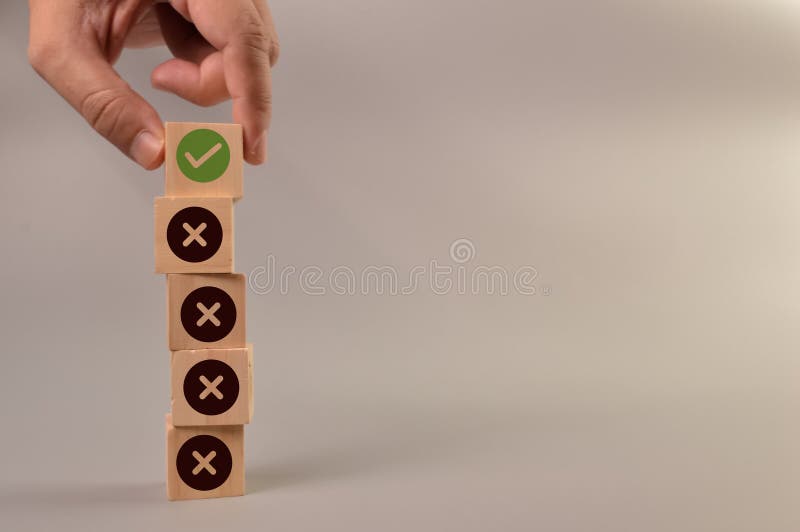 Check Mark and Cross Marks on Wooden Blocks with Copy Space Stock Photo ...