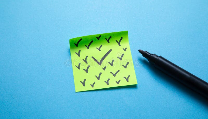 Check Marks on Sticky Note on the Blue Background Stock Photo - Image ...