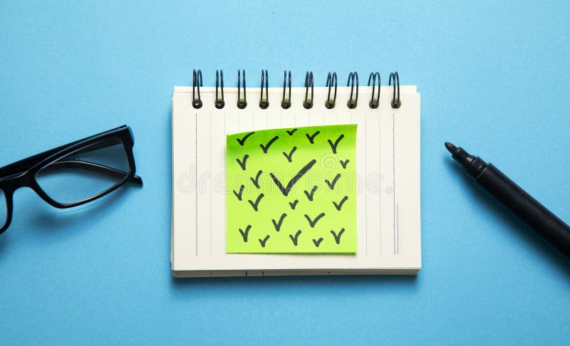 Check Marks on Sticky Note on the Blue Background Stock Photo - Image ...