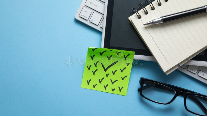 Check Marks on Sticky Note on the Blue Background Stock Photo - Image ...