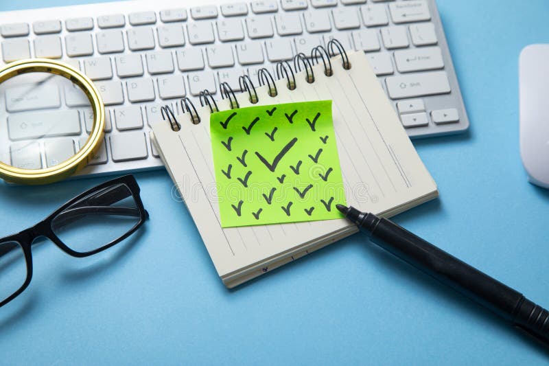 Check Marks on Sticky Note on the Blue Background Stock Photo - Image ...