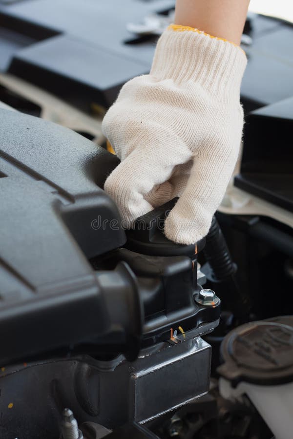 Check the oil level in car stock image. Image of automobile - 70354423