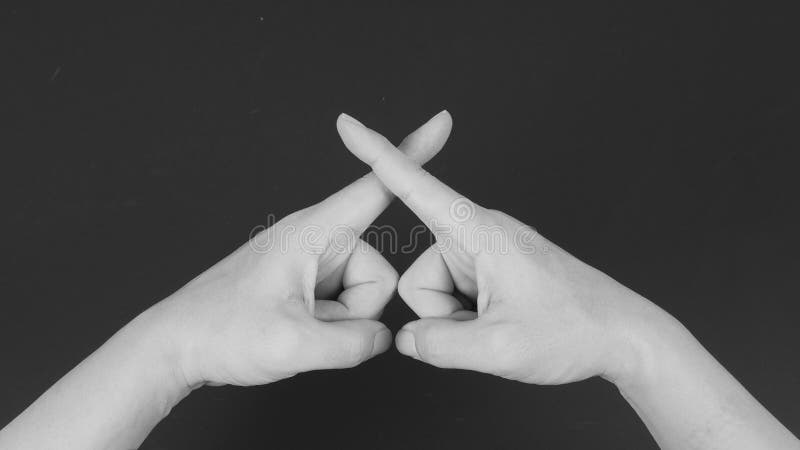 Check Please! Hand Sign by Making an `X` with Fingers on Black and ...