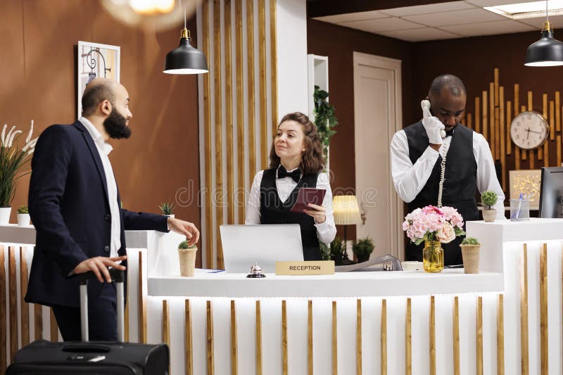 Check in Procedure at Hotel Reception Stock Photo - Image of documents ...