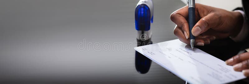 Checkbook Check Holding and Signing Stock Photo - Image of person ...