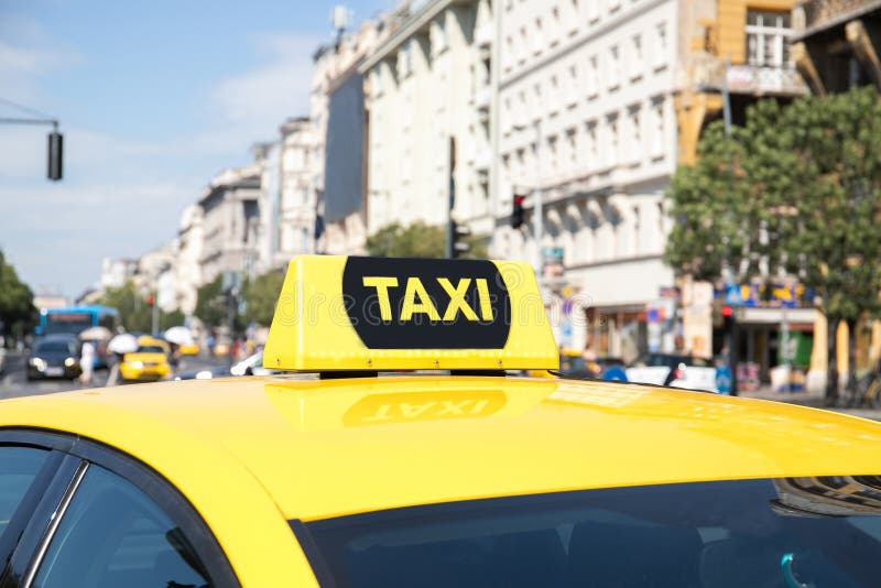 Checker Taxi by Car. Taxi in the City Stock Photo - Image of signs ...