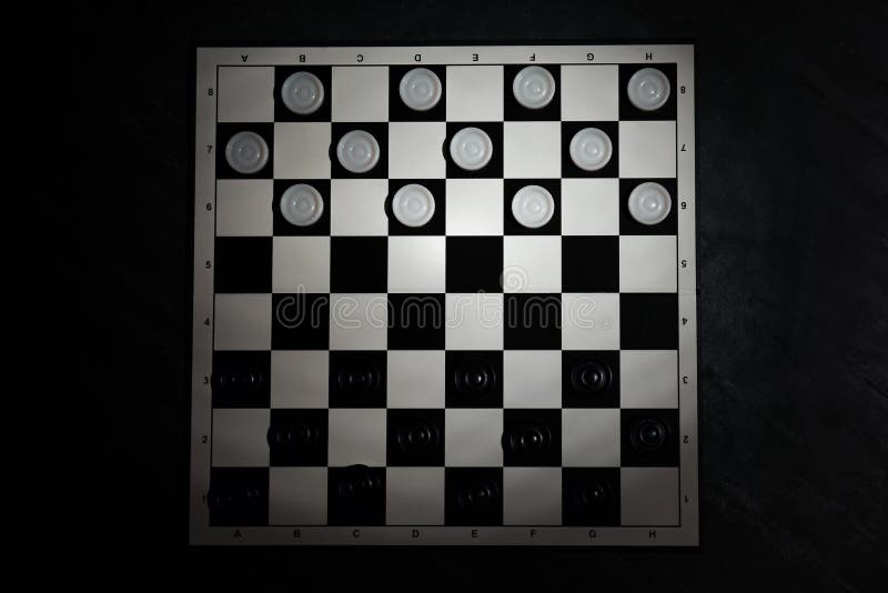 Checkerboard with Game Pieces on Black Table, Top View Stock Photo ...